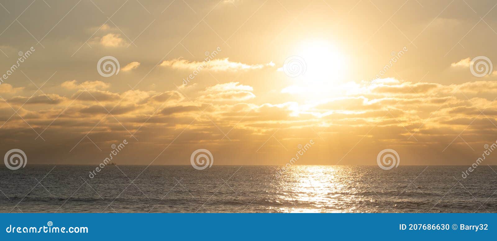 Sun Reflected on Ocean at Sunset on the Beach Stock Photo - Image of ...