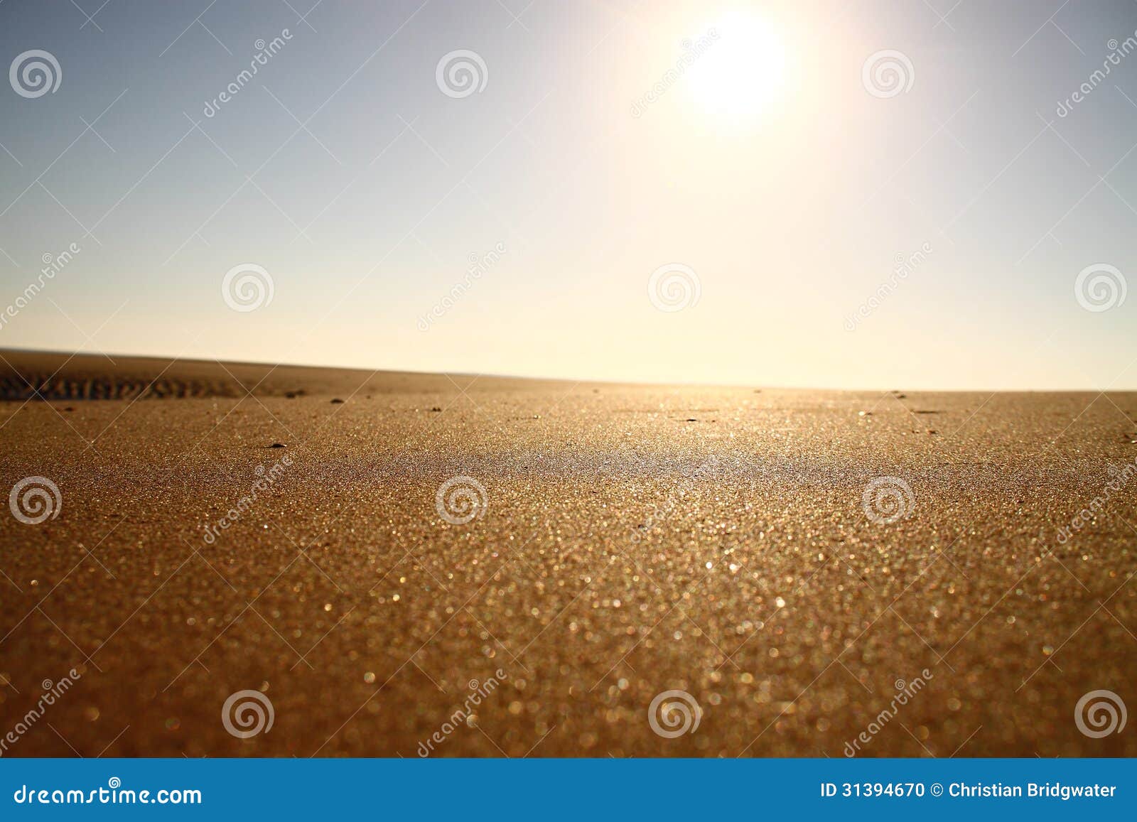 Sun reflecting on sand stock photo. Image of texture - 31394670