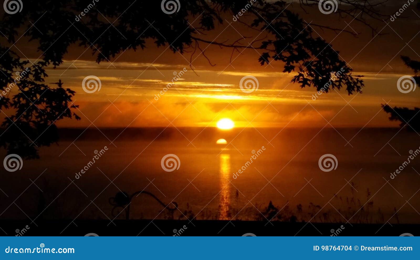 Sun rise over lake dubay stock photo. Image of rise, lake - 98764704