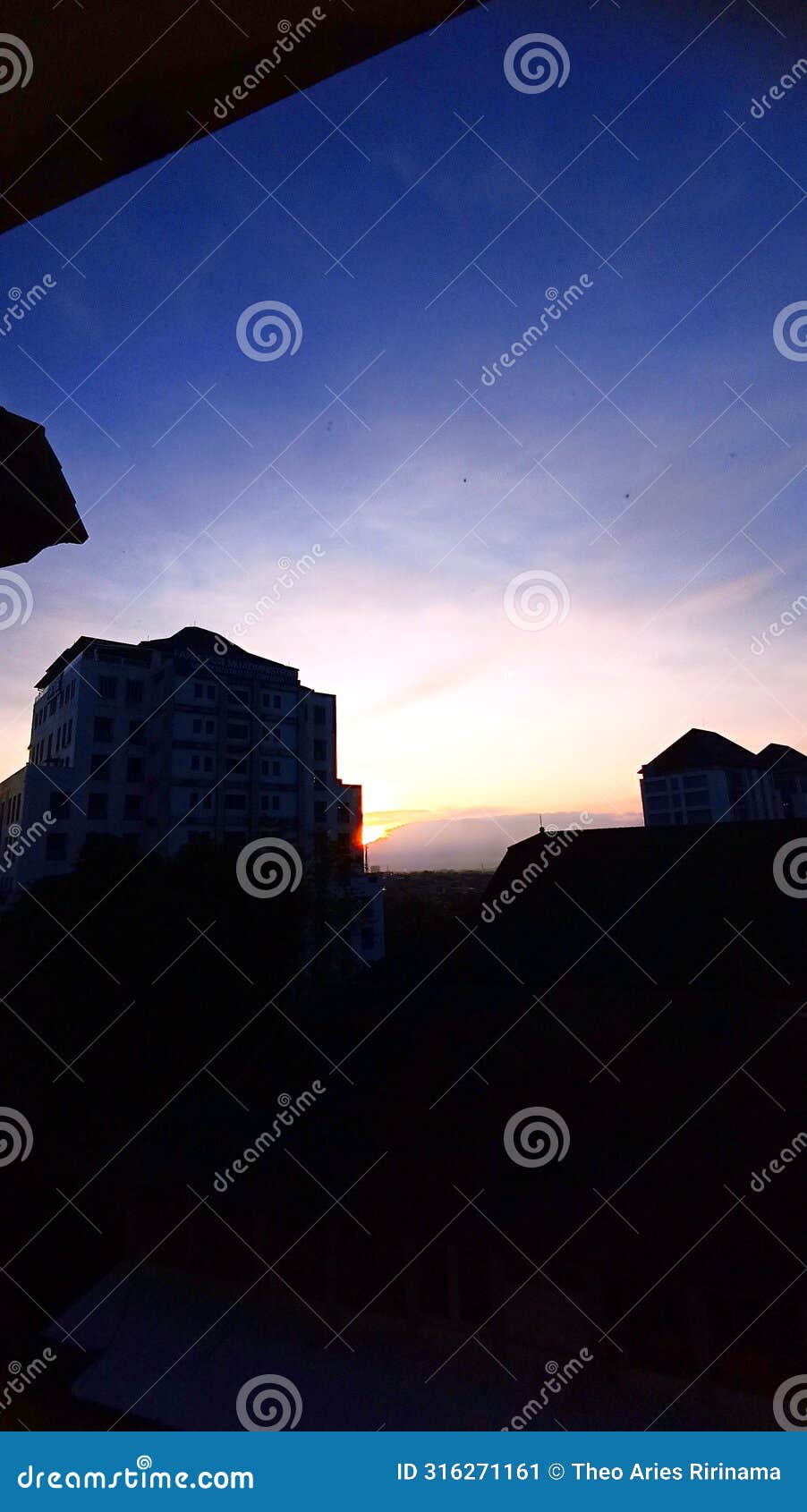 The Sun Rises from Behind the Building Which is so Beautiful Stock ...