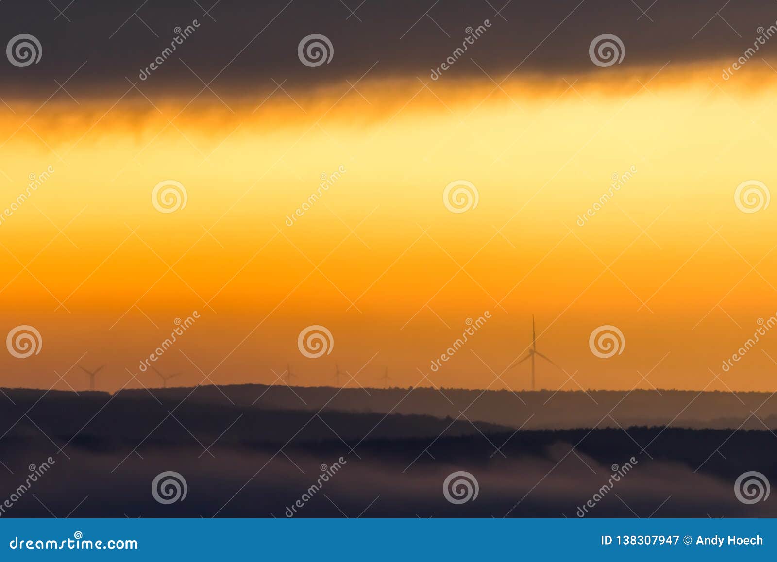 The Sun Rises Over the Wind Power Wheels Stock Image - Image of cloud ...