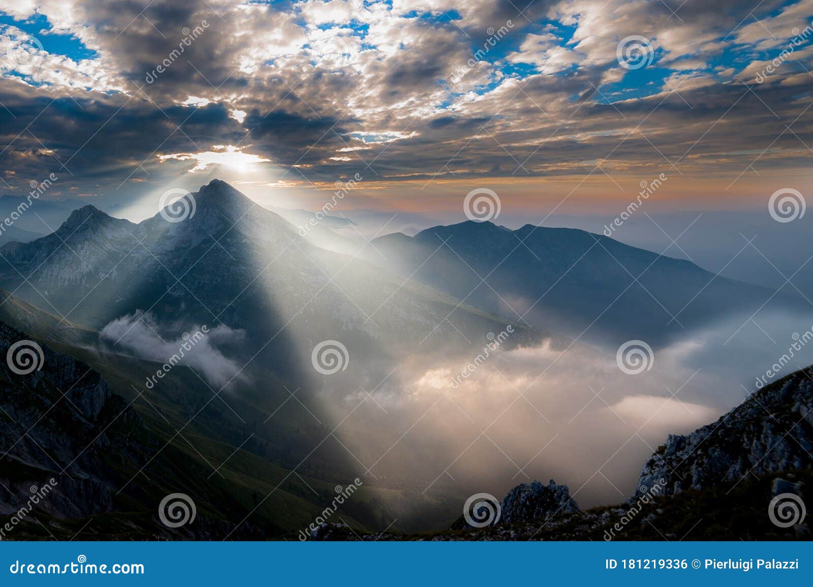 The Sun Rising Behind the Mountain Stock Photo - Image of cliff ...
