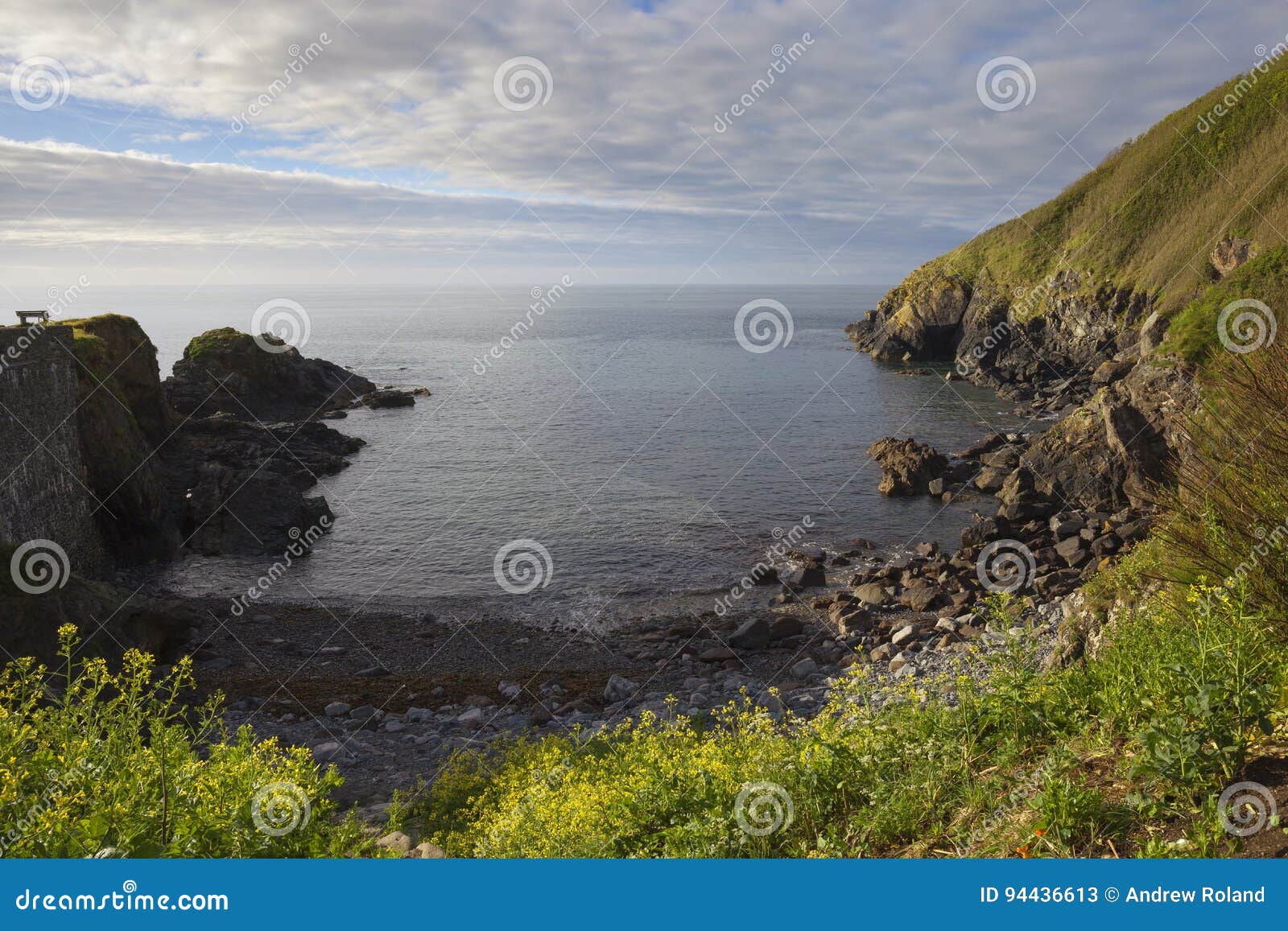 The Sun Rising at Little Cove, Cadgwith, Cornwall, England Stock Image ...