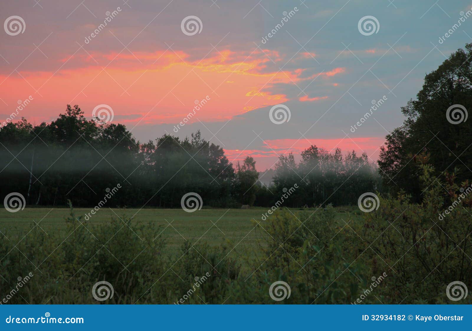 Sun rising over the field stock photo. Image of morning - 32934182