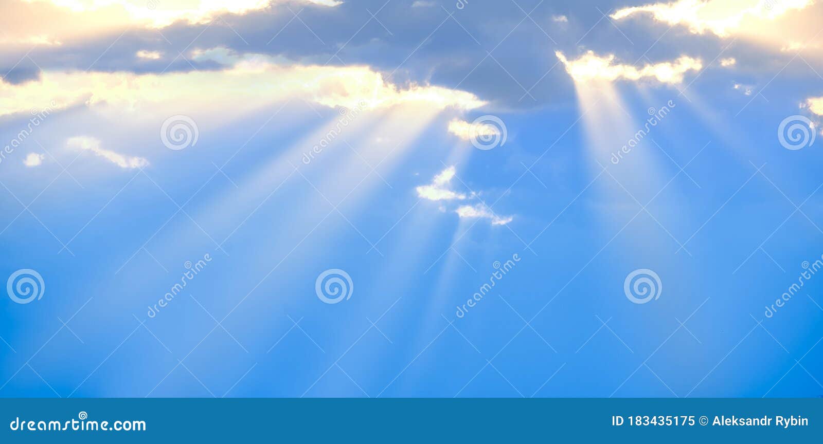 The Sun`s Rays Break through the Blue Clouds. the Background of the Sky ...