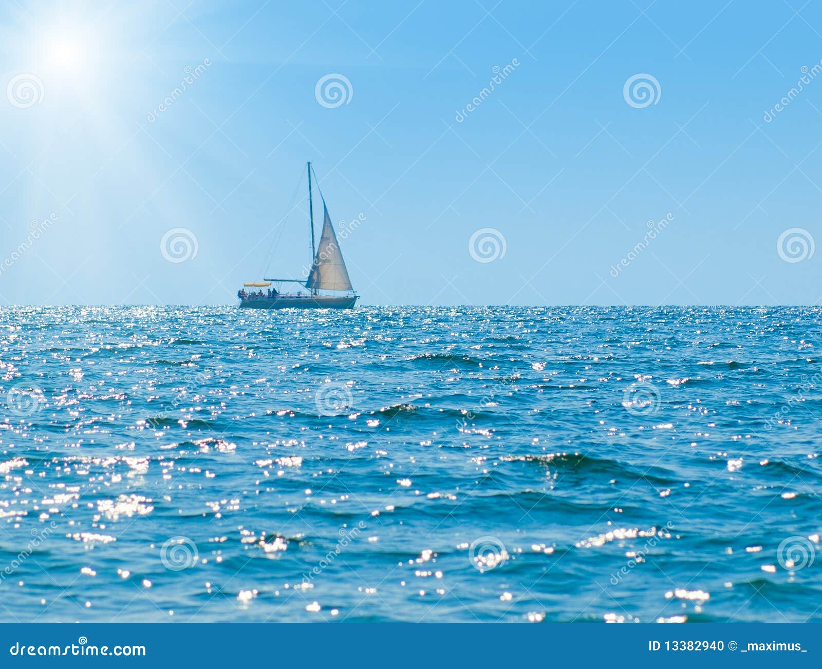 Sun and sailboat stock photo. Image of blue, sport, beach - 13382940