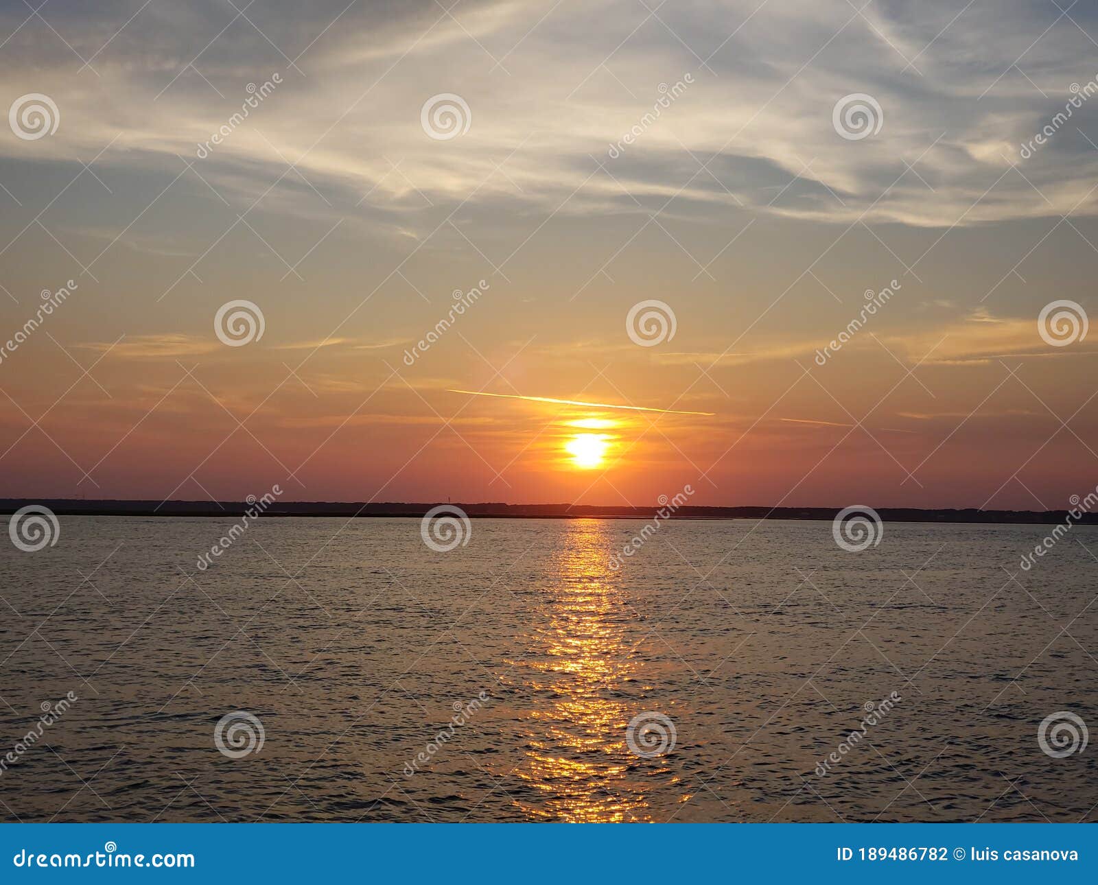 Sun set at the beach stock photo. Image of dusk, sunrise - 189486782