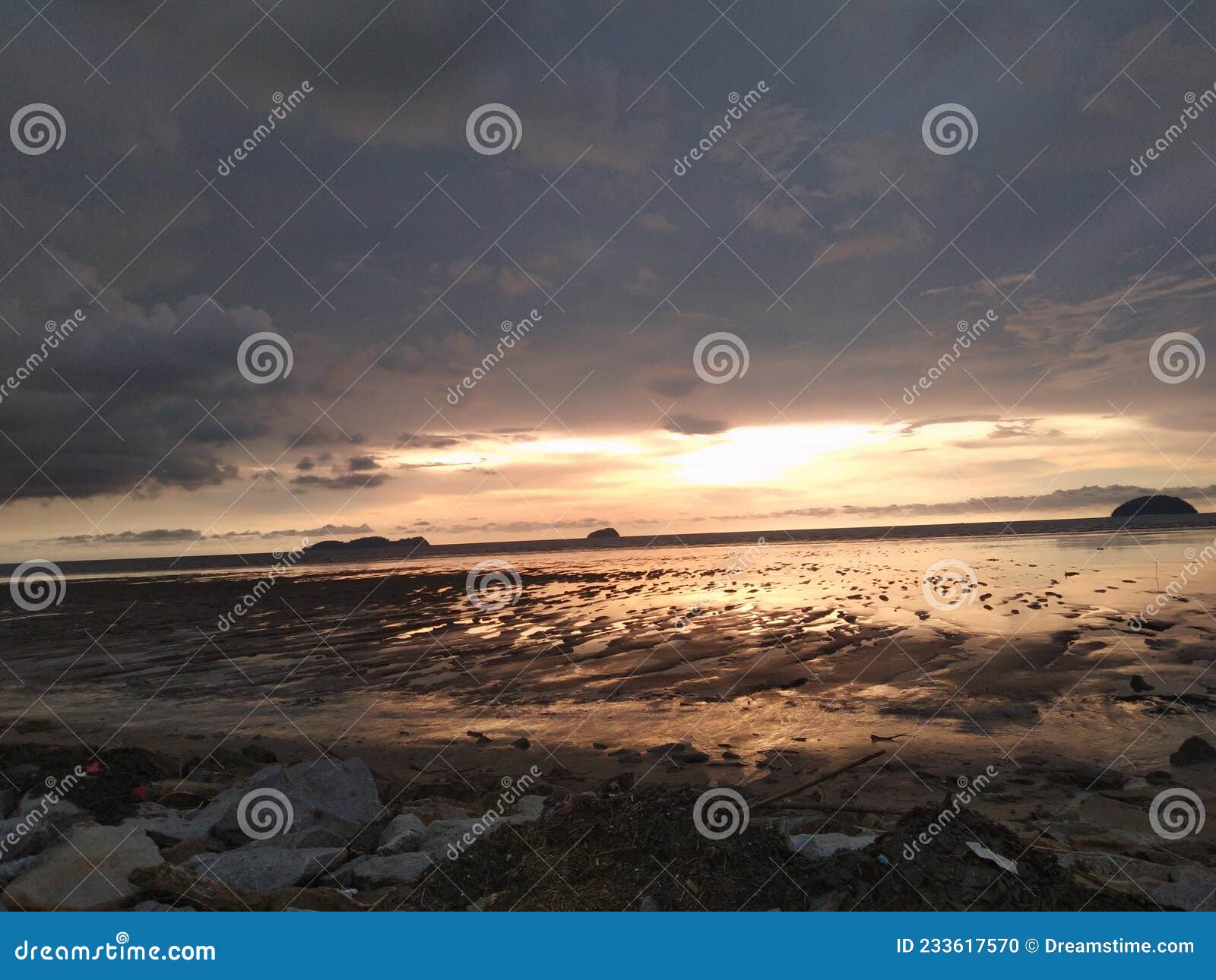 Sun set at the beach stock photo. Image of evening, morning - 233617570