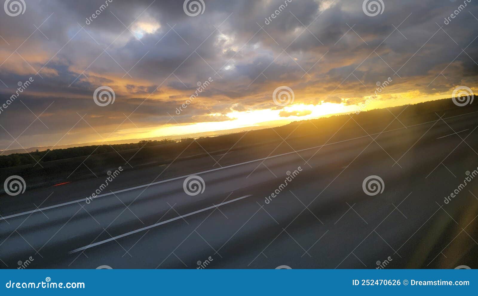 Sun set on the drive stock photo. Image of reflection - 252470626