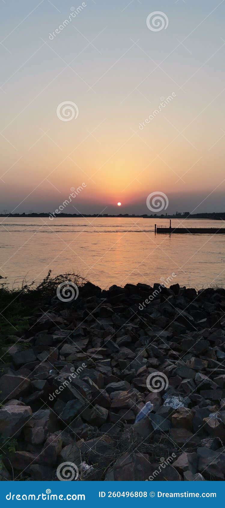 Sun set river stock photo. Image of sunlight, horizon - 260496808