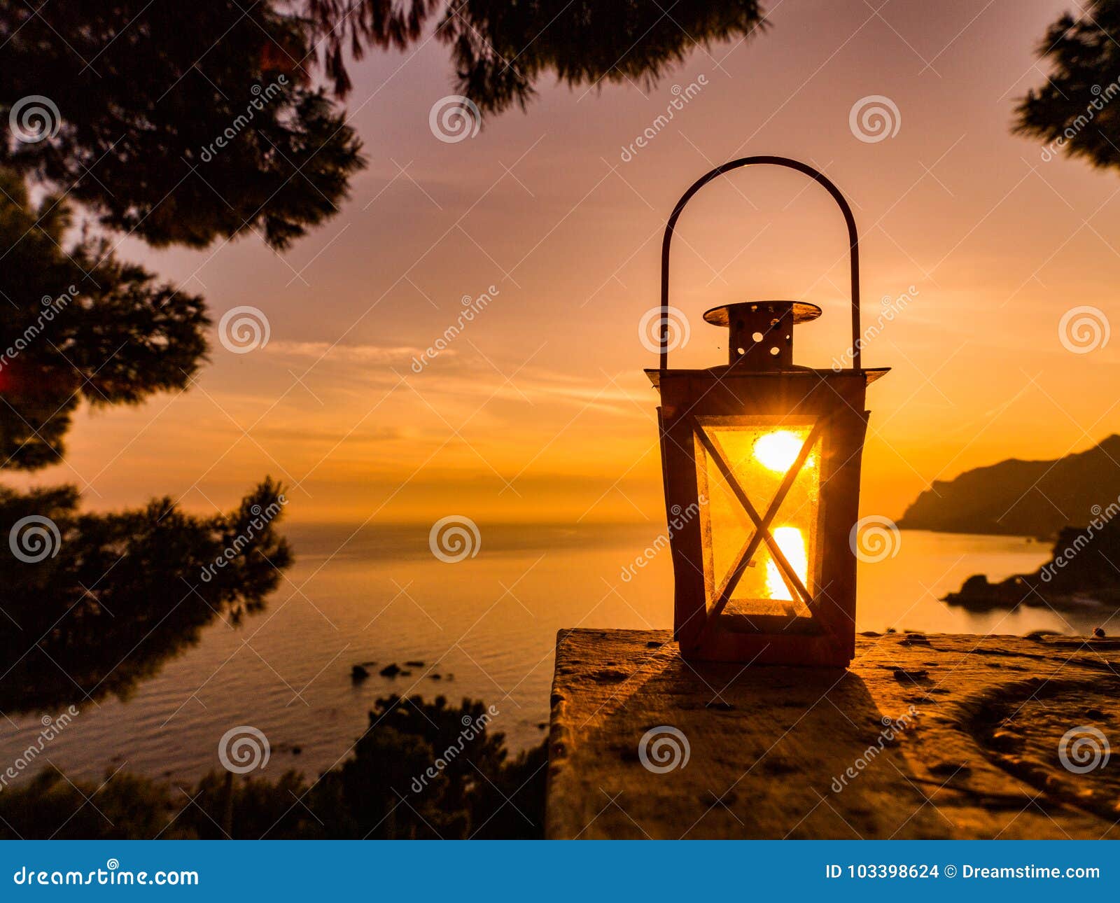Sunset in a lantern. stock photo. Image of yellow, light - 103398624