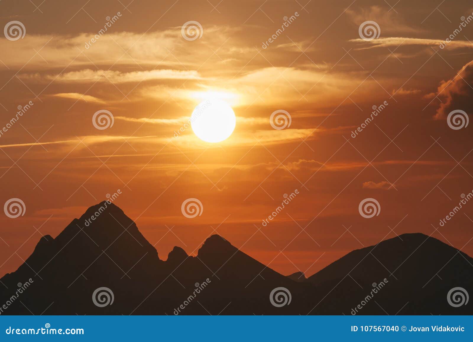The Sun Sets Over the Mountain Peaks Stock Photo - Image of park ...