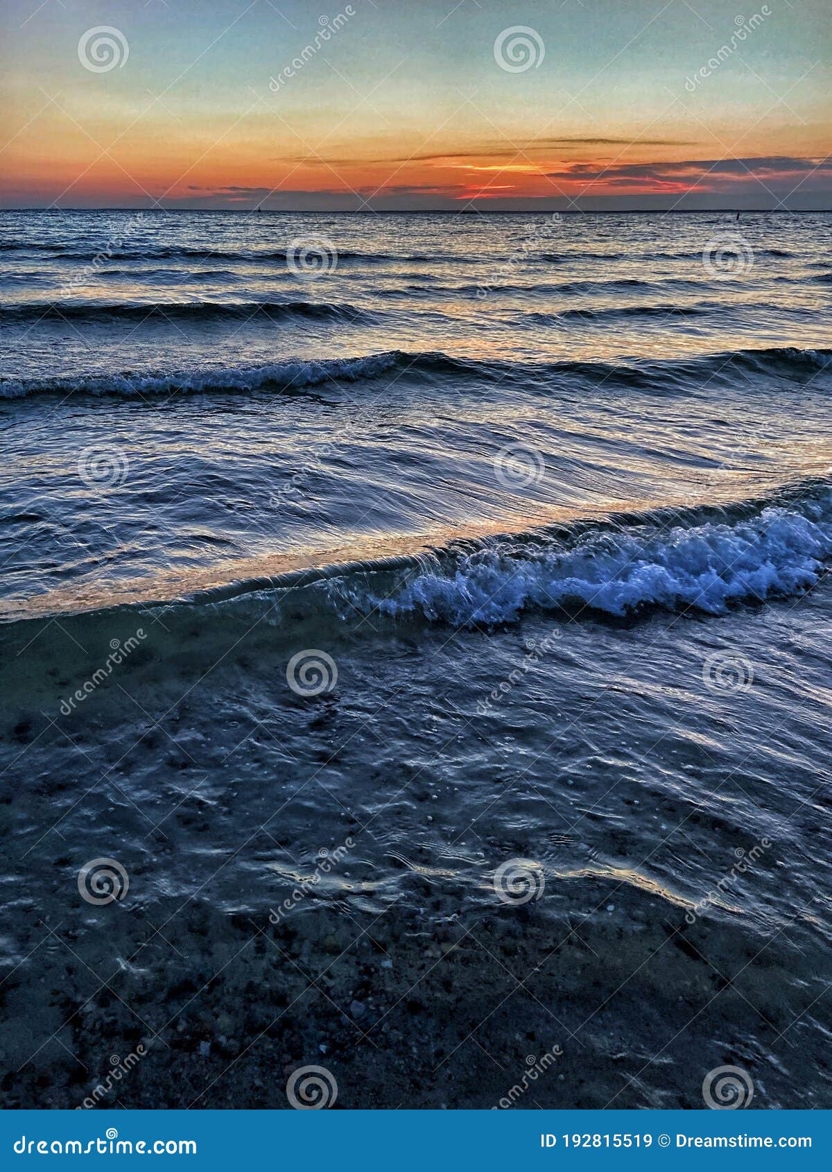 Sun setting on the beach stock image. Image of beach - 192815519