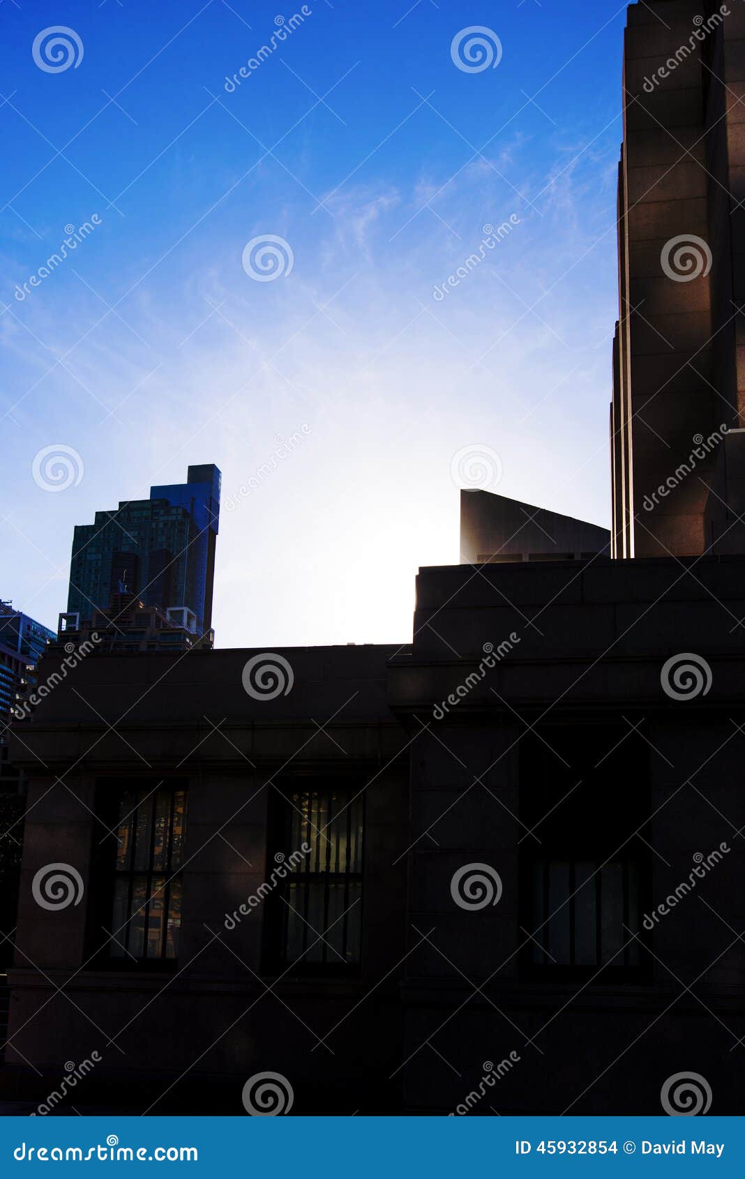 Sun Setting Behind Buildings Stock Photo - Image of city, setting: 45932854