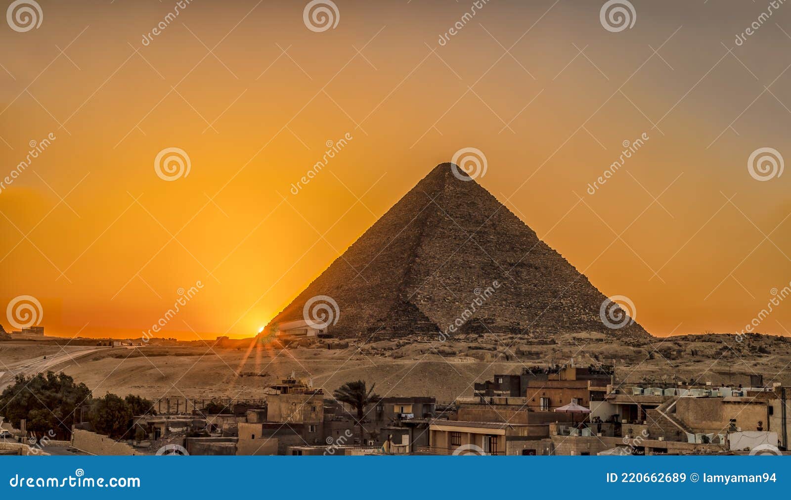 The Sun Setting Behind the Great Pyramid of Giza Stock Image - Image of ...