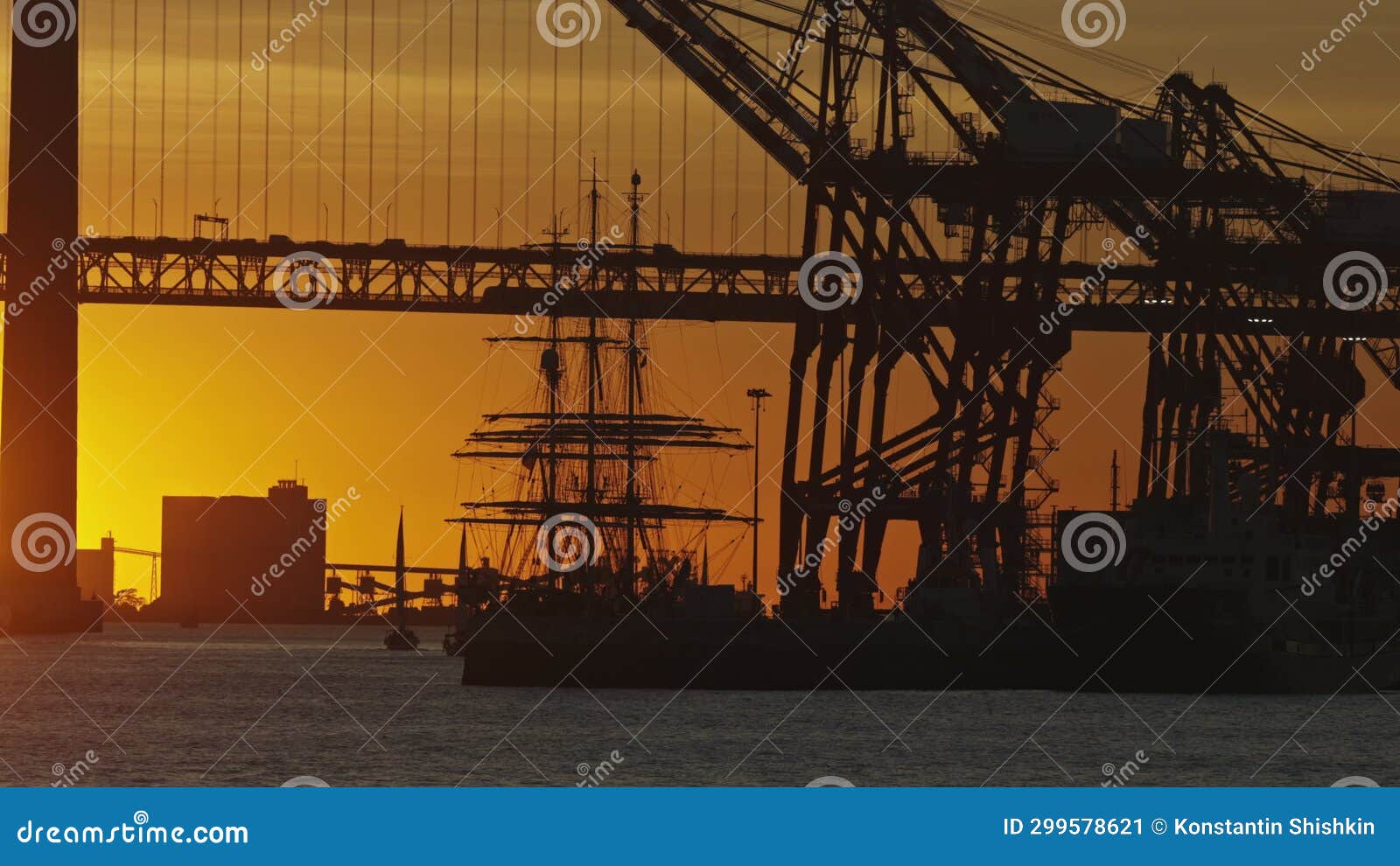 Sunset Behind Large Bridge in Front of Sailing Vessel Stock Video ...
