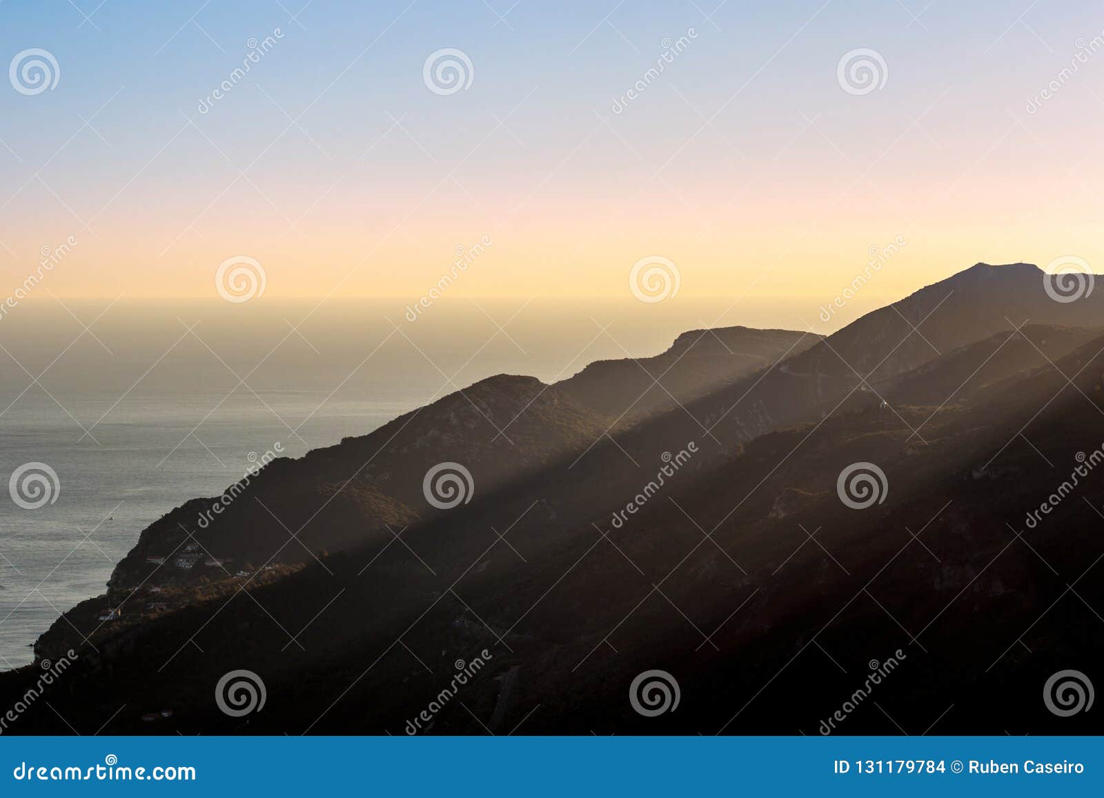 Sun Setting Behind the Mountains Stock Photo - Image of contrast, dawn ...