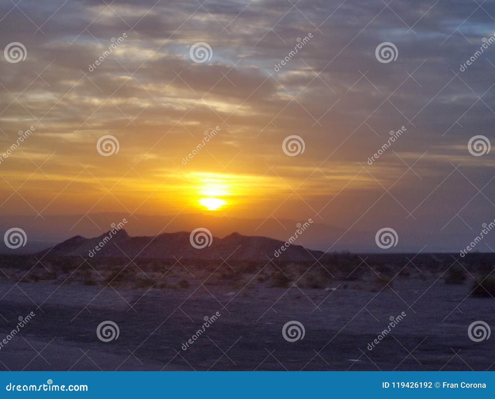 Sun setting in the desert stock photo. Image of barstow - 119426192