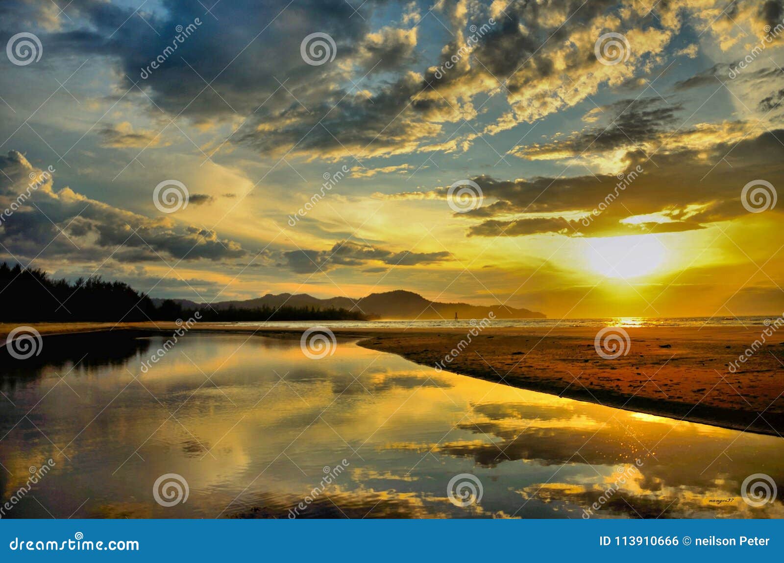 Sun is setting down stock photo. Image of sunset, beach - 113910666