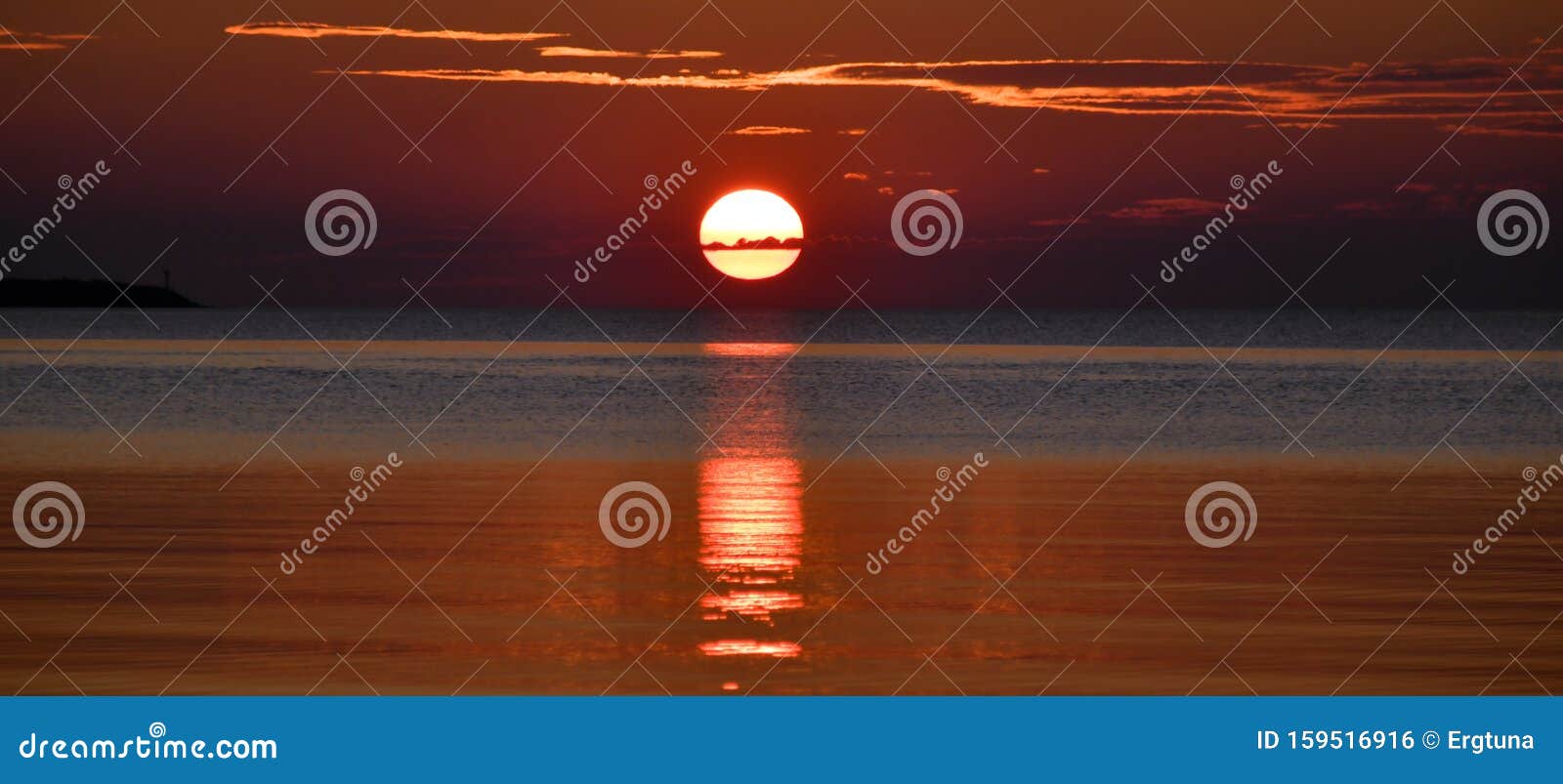 The Sun is Setting and Evening is Falling As Hope Rises Stock Photo ...