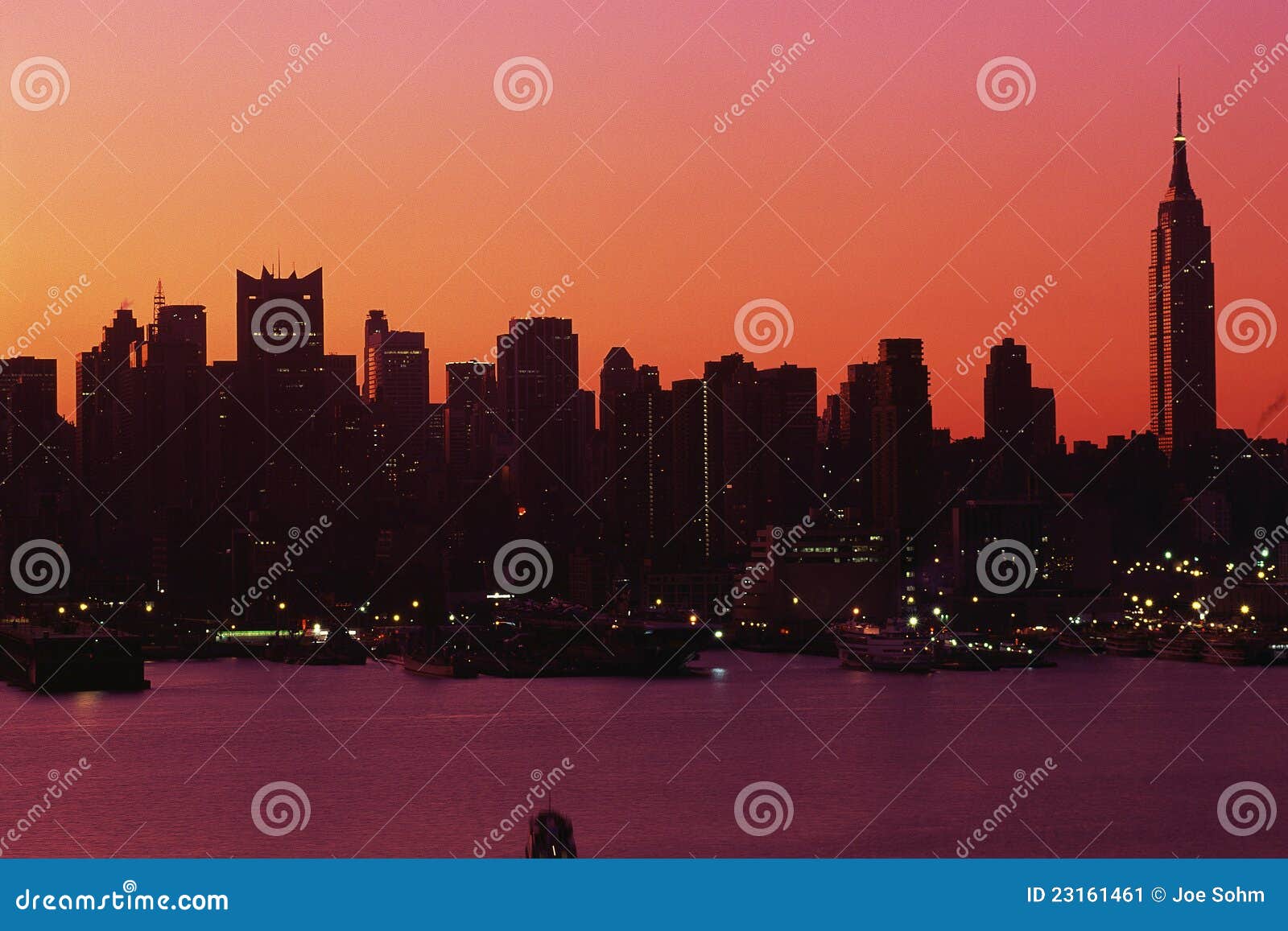 Sun setting on New York editorial photo. Image of cities - 23161461