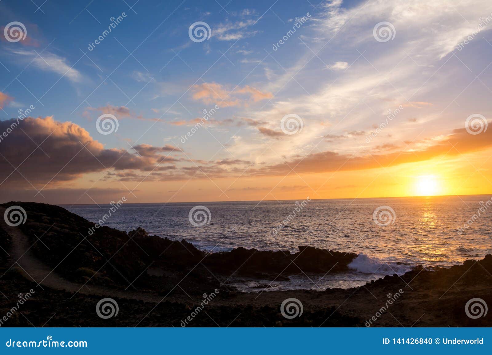 Sun Setting on the Ocean stock photo. Image of nature - 141426840