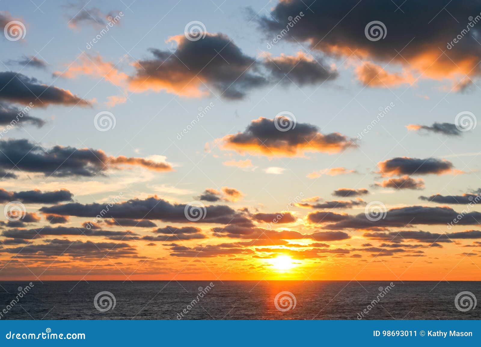 Sun setting on the ocean stock image. Image of sunset - 98693011