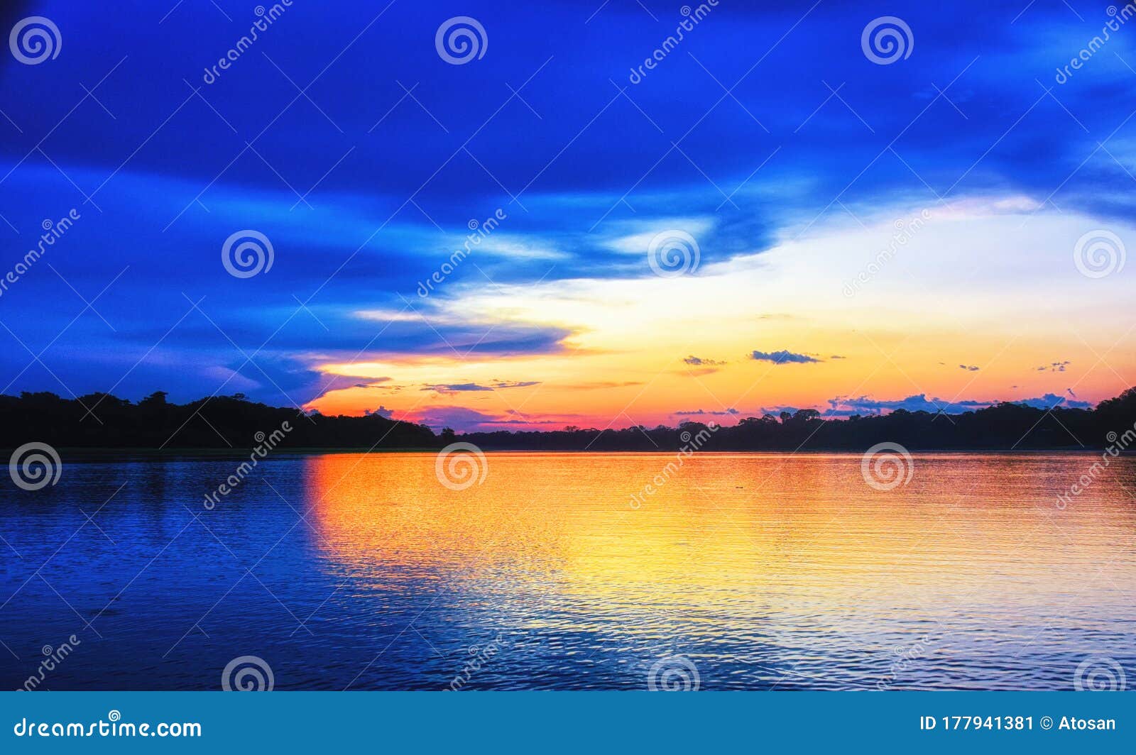 The Sun Setting Over the Amazon River Stock Image - Image of reflection ...