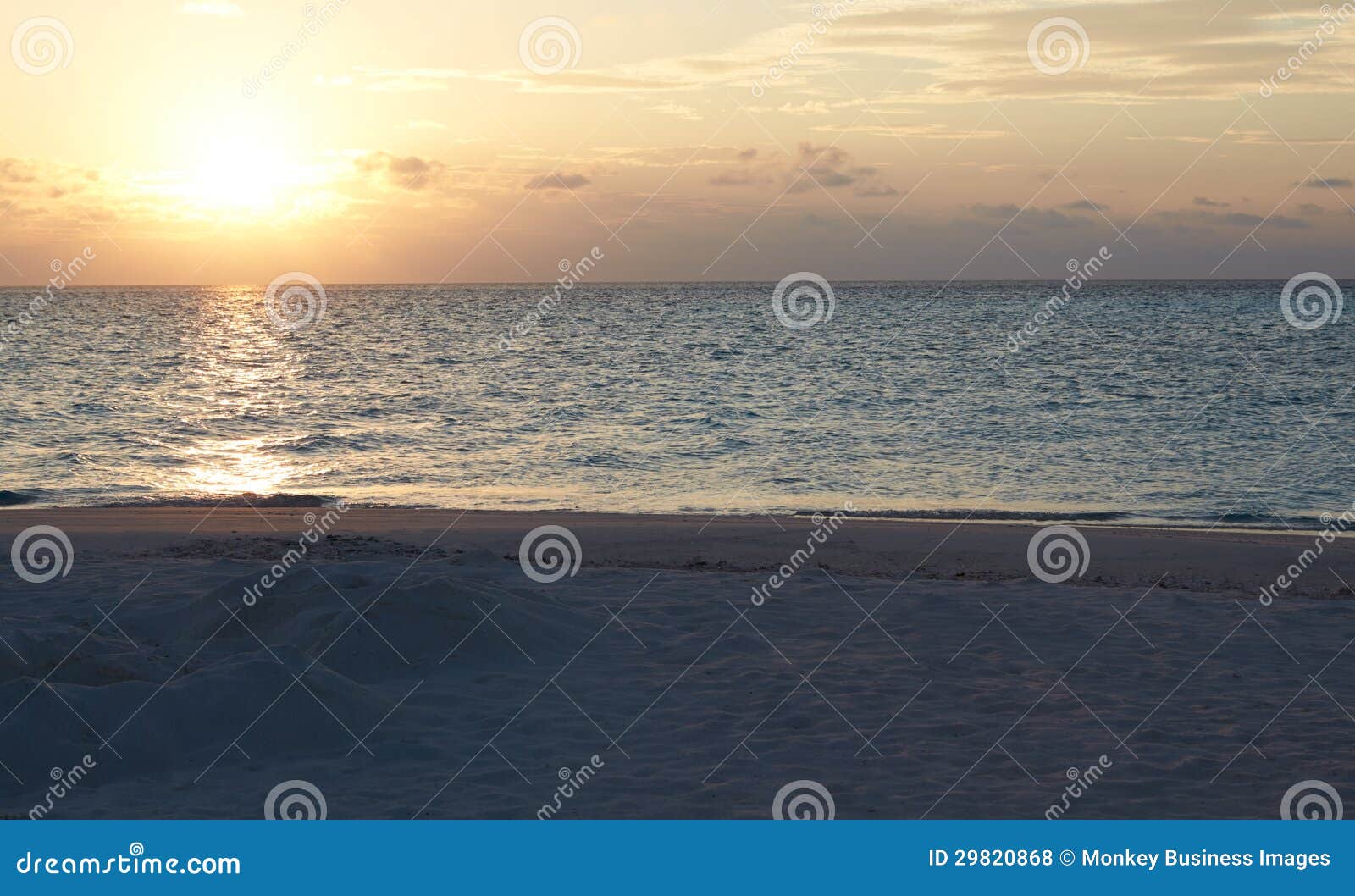 Sun Setting Over Beautiful Deserted Beach Stock Photo - Image of copy ...