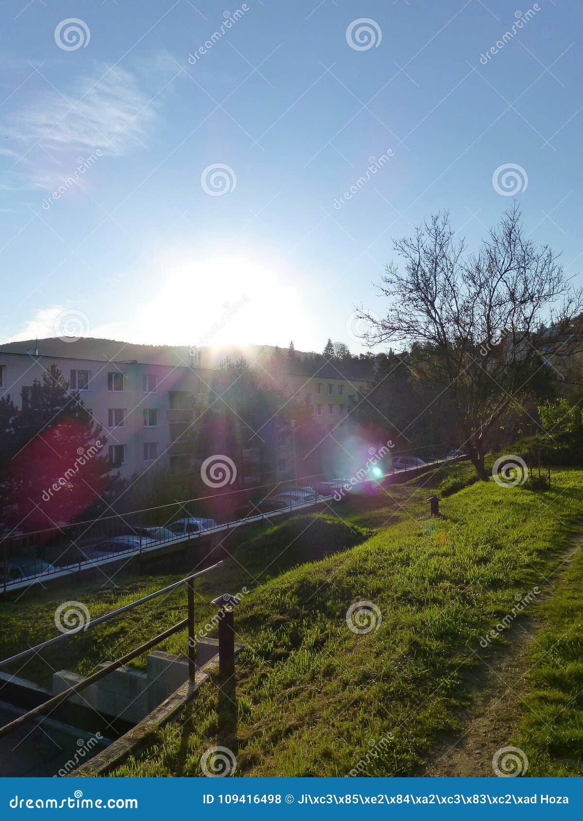 Sun setting over the city stock photo. Image of bright - 109416498