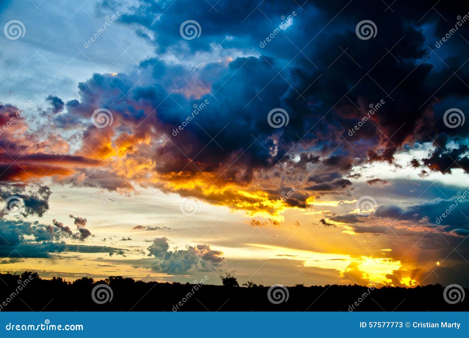 Sun setting over field stock image. Image of black, dusk - 57577773