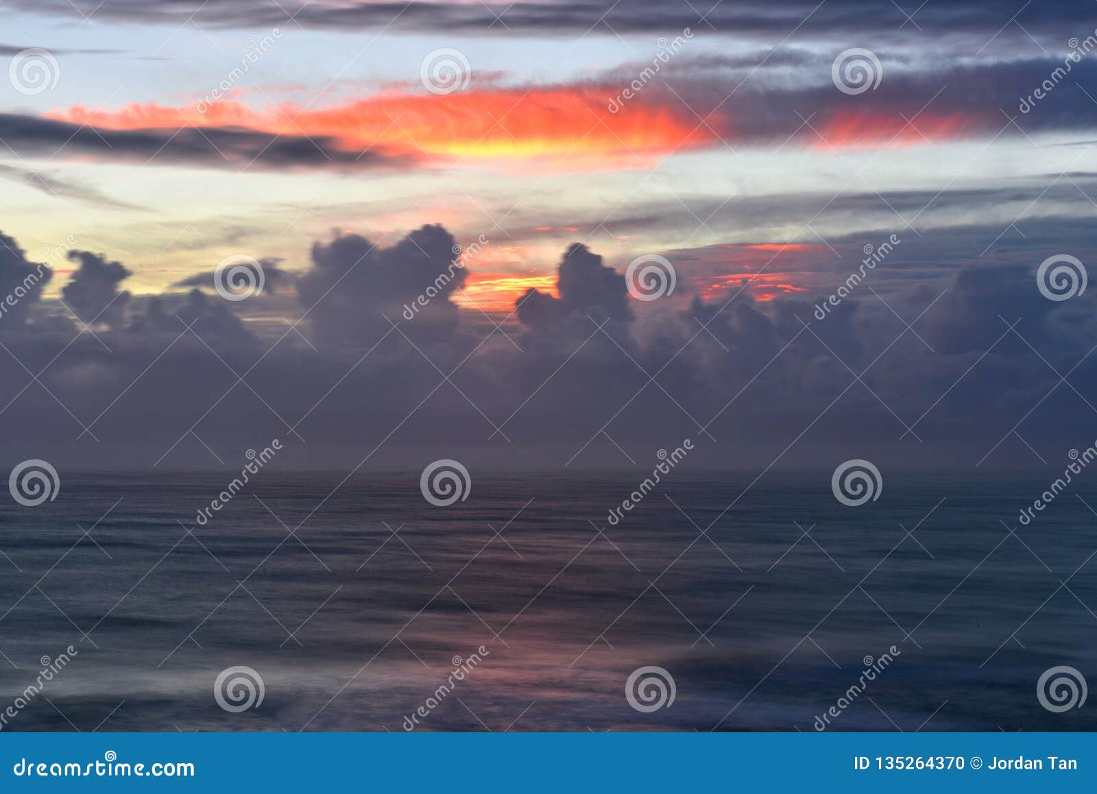Sun Setting Over the Horizon Stock Photo - Image of zealand, cloud ...