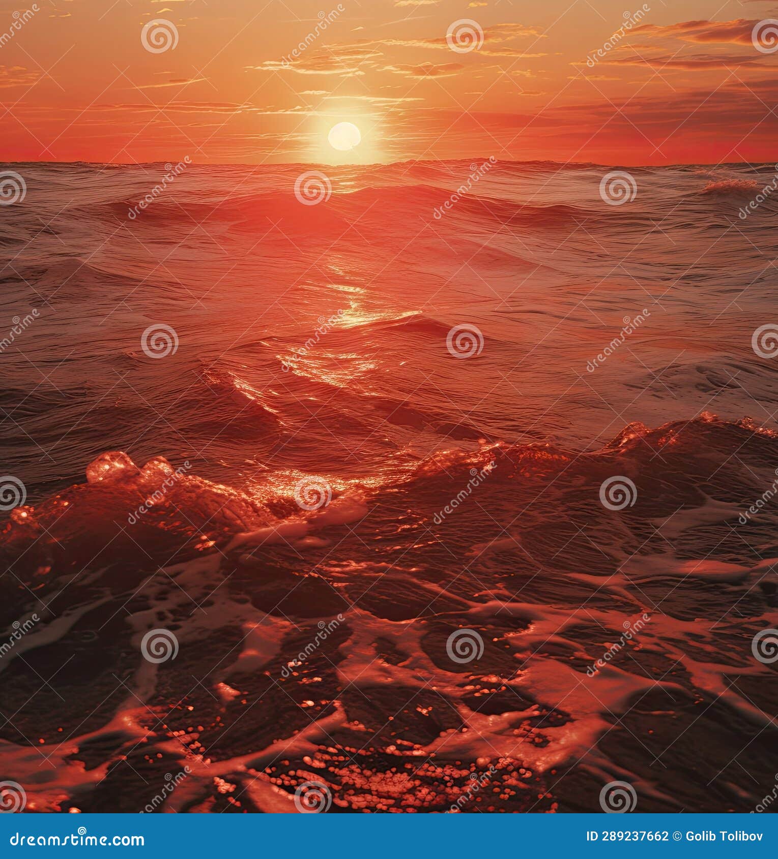 A Sunset Over the Ocean with the Sun Setting Over Stock Photo - Image ...