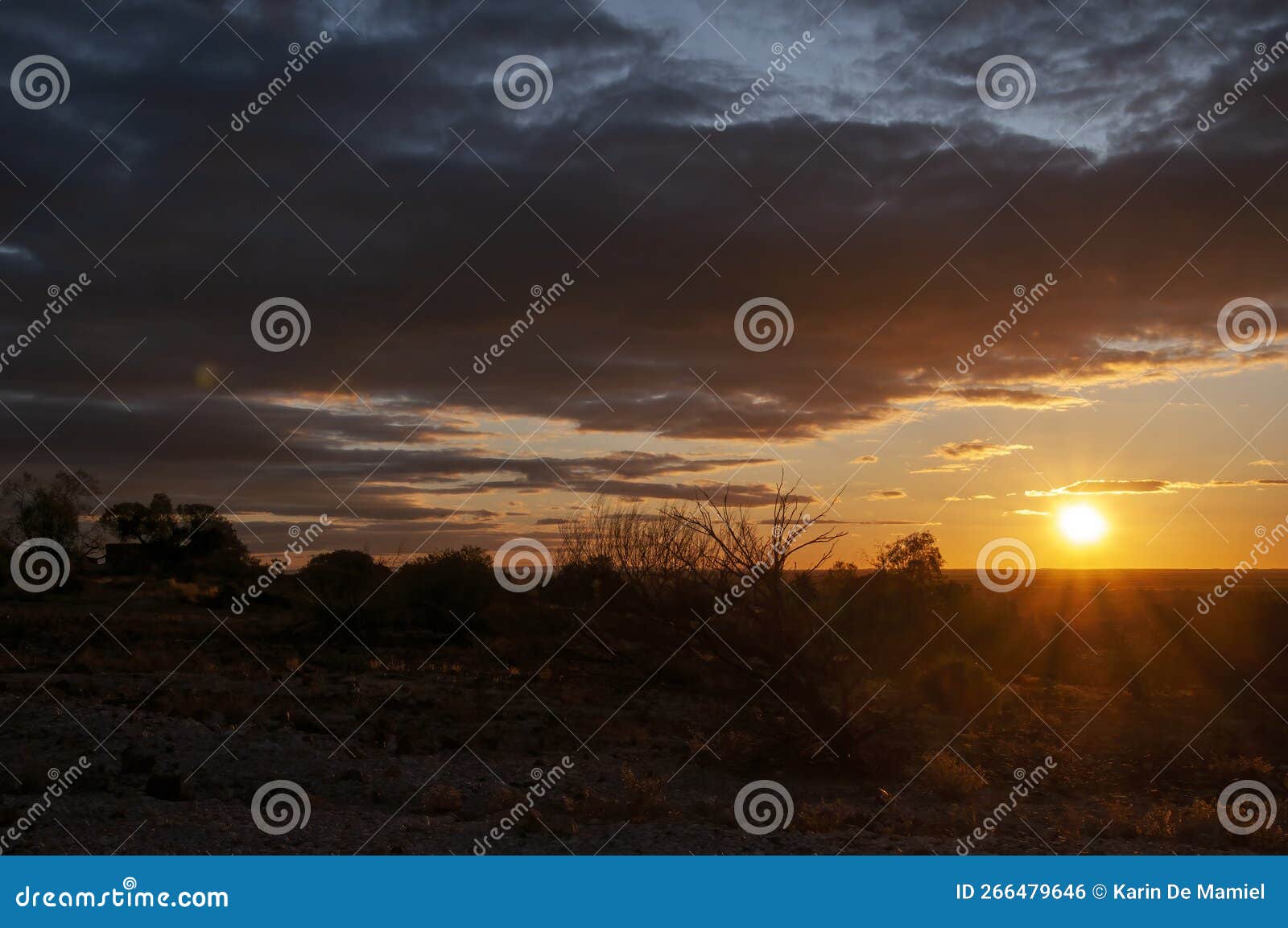 Sun Setting Over the Outback Stock Photo - Image of dusk, landscape ...