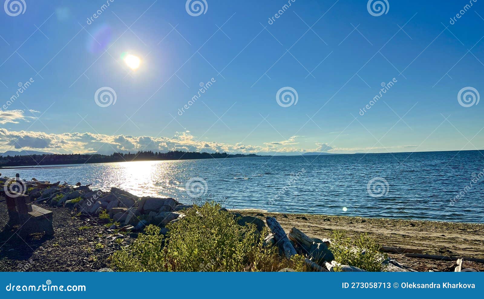 The Sun is Setting Over the Stone Beach the Reflections Pacific Ocean ...