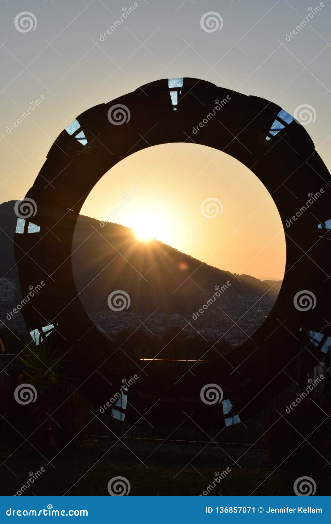 The Sun Setting Over the Turkish Mountain Seen through a Tyre Shaped ...
