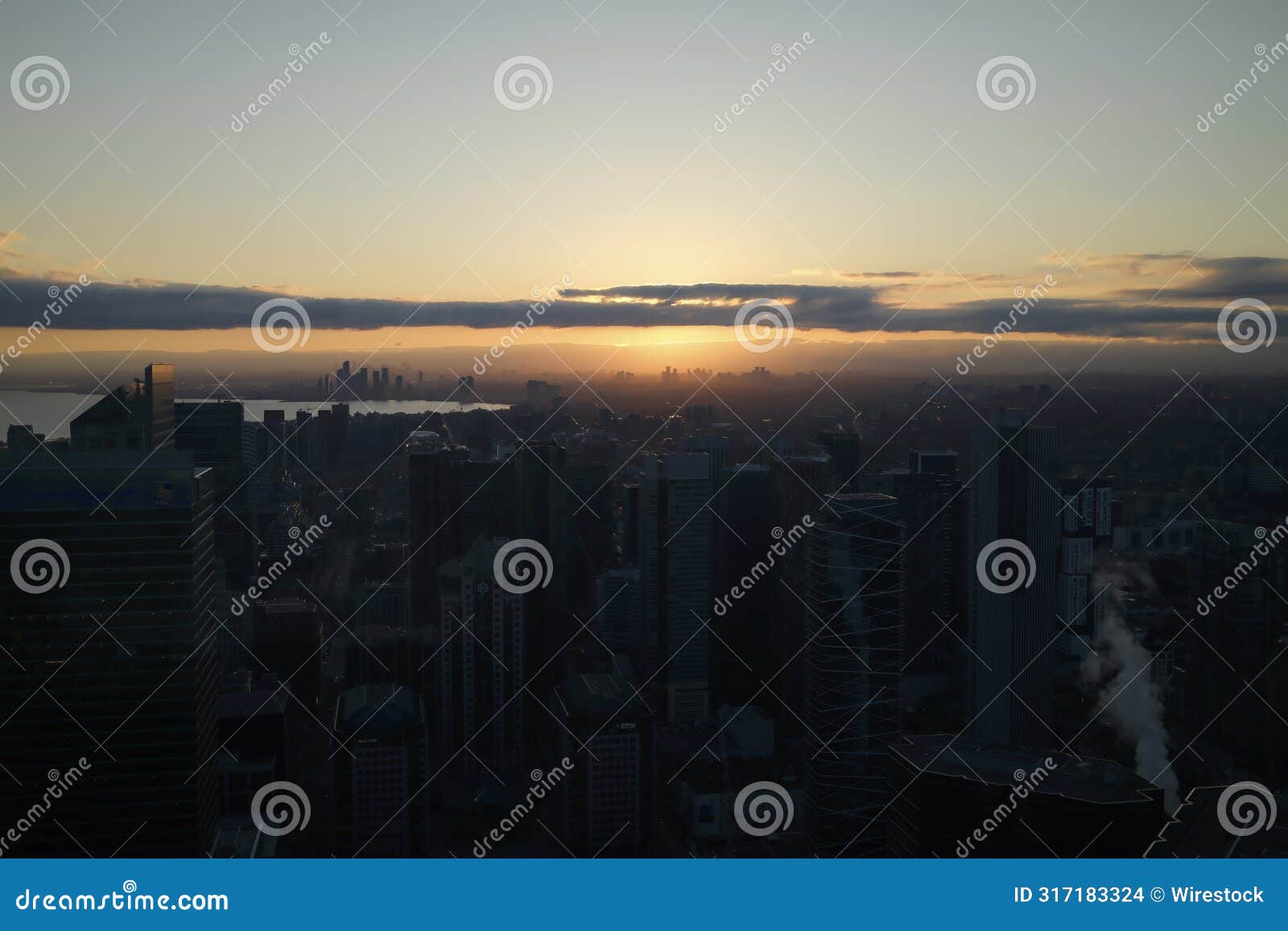 Sun Setting Over Urban Skyline with Tall Skyscrapers Stock Photo ...