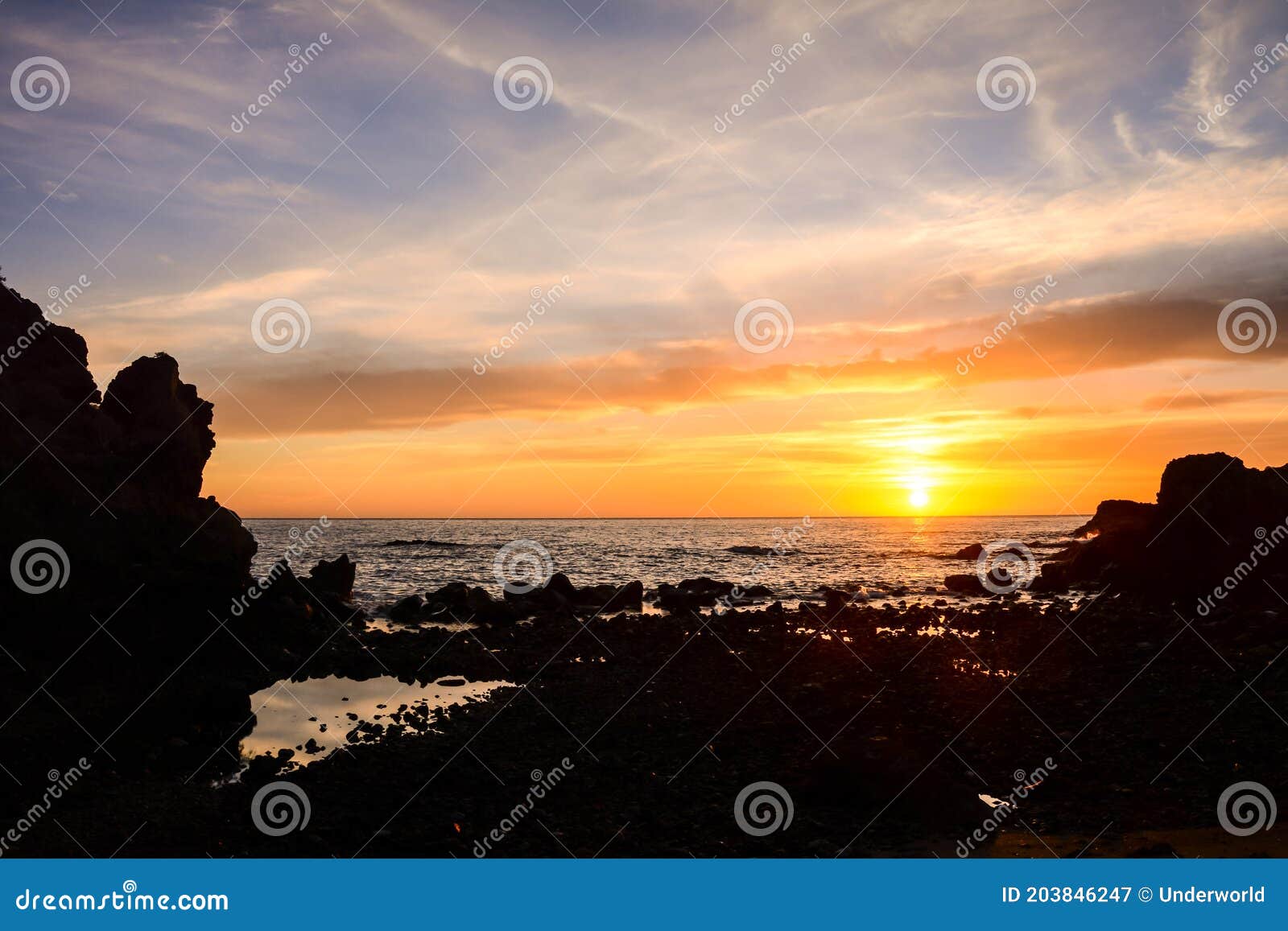 The Sun Setting in the Sea stock image. Image of west - 203846247