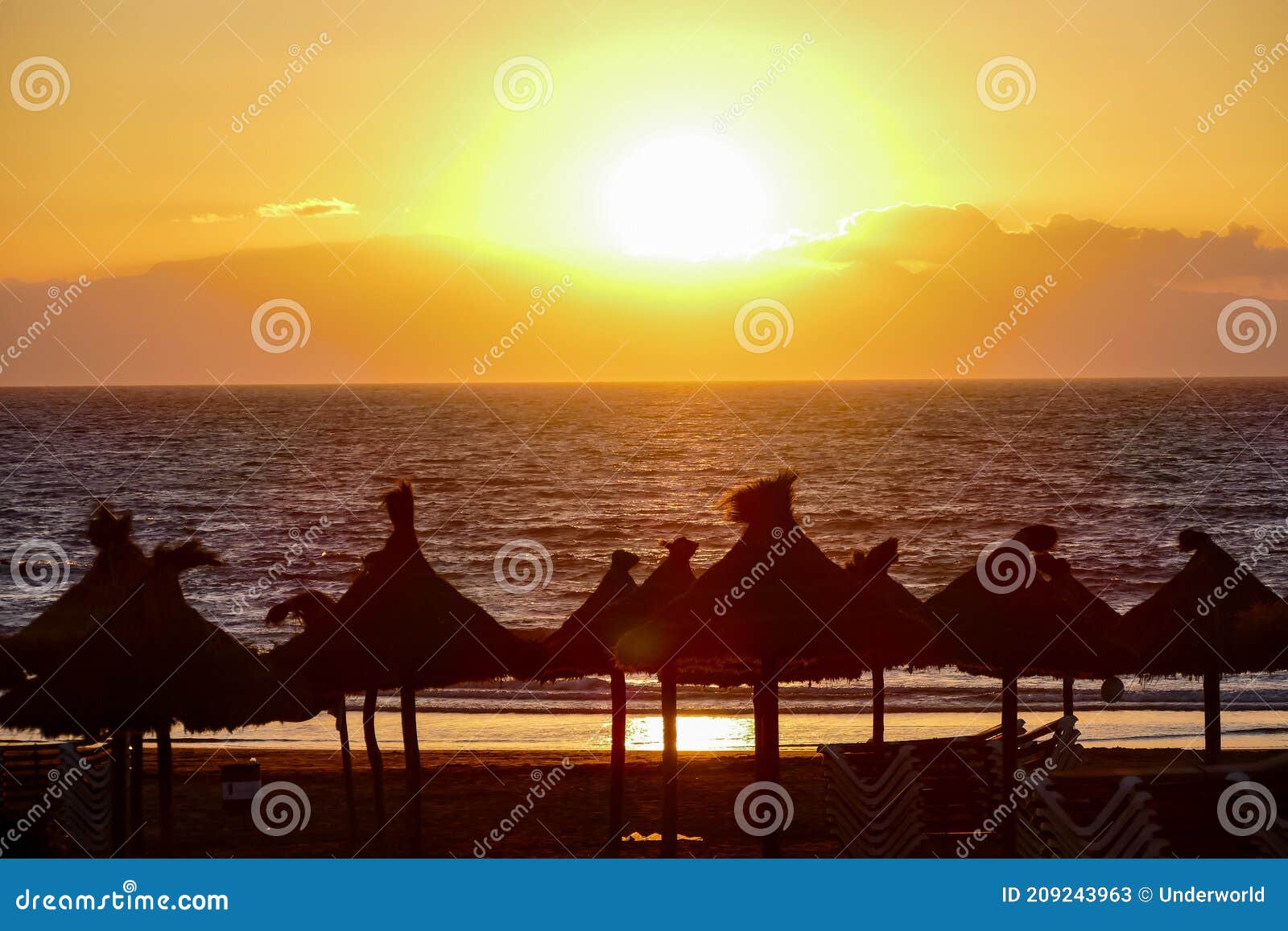 The Sun Setting in the Sea stock image. Image of ocean - 209243963