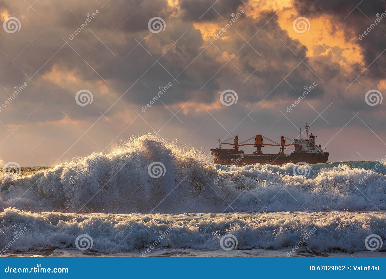 Sun Setting at the Sea with Sailing Cargo Ship Stock Photo - Image of ...