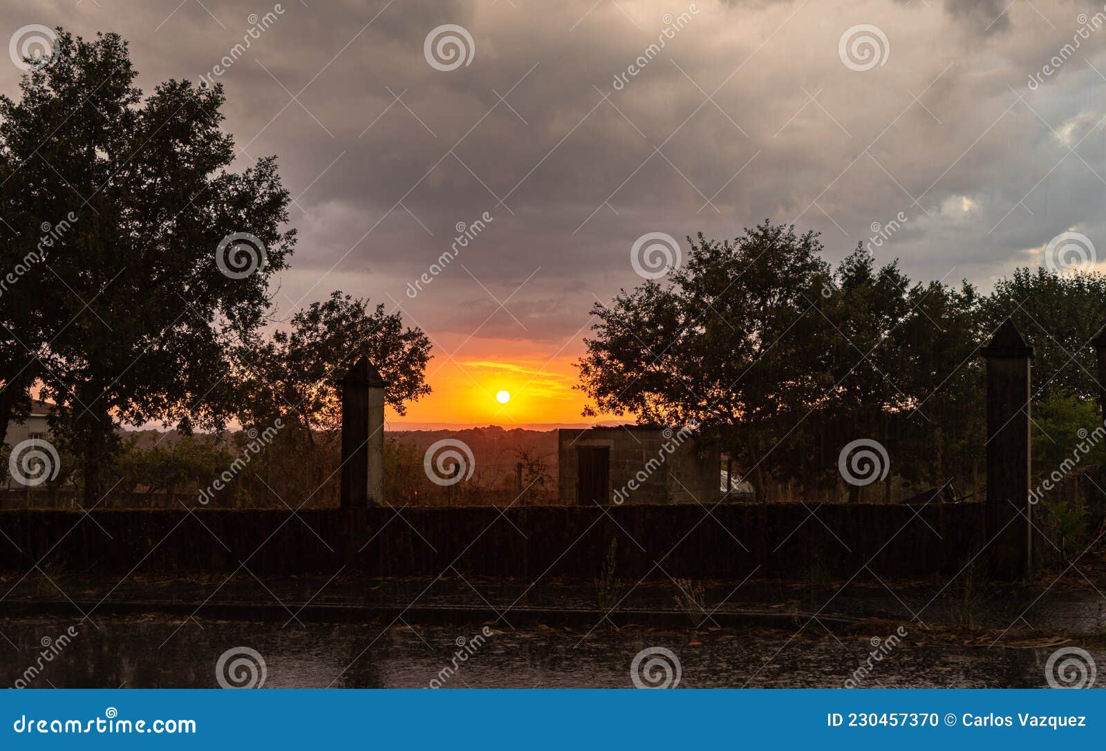 Sun setting in the storm stock photo. Image of blue - 230457370