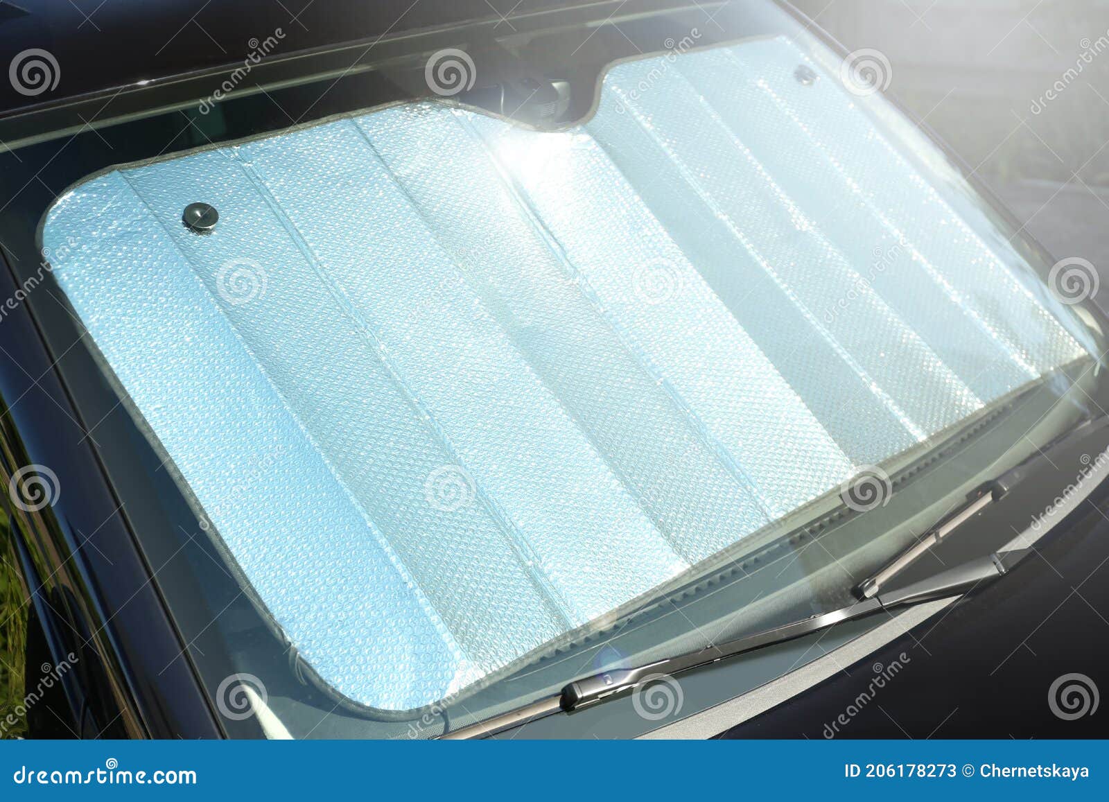 Sun Shade Under Windshield Inside Car, Closeup. Heat Protection Stock ...