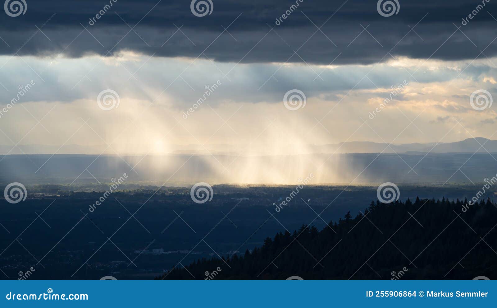 The Sun Shines through a Gap in the Clouds and Makes the Rain Glow ...