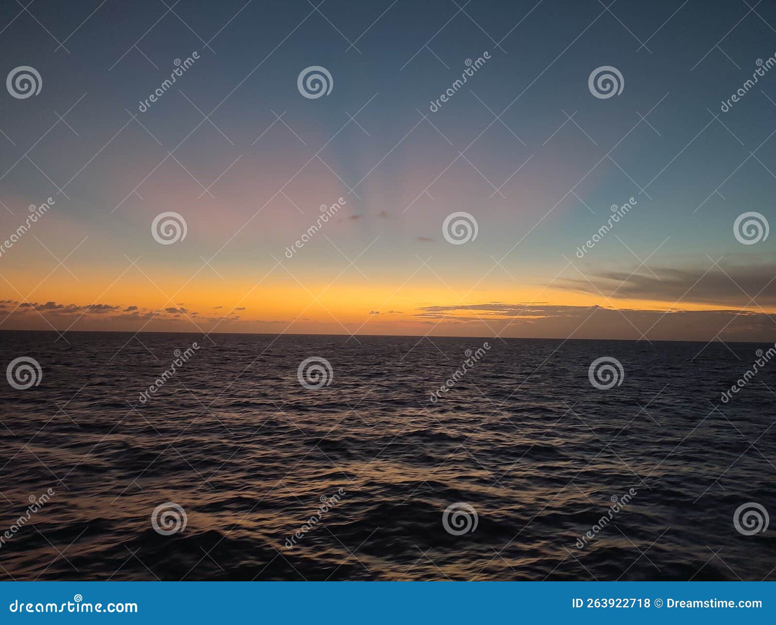The Sun Shines in the Middle of the Vast Ocean of Indonesia Stock Photo ...