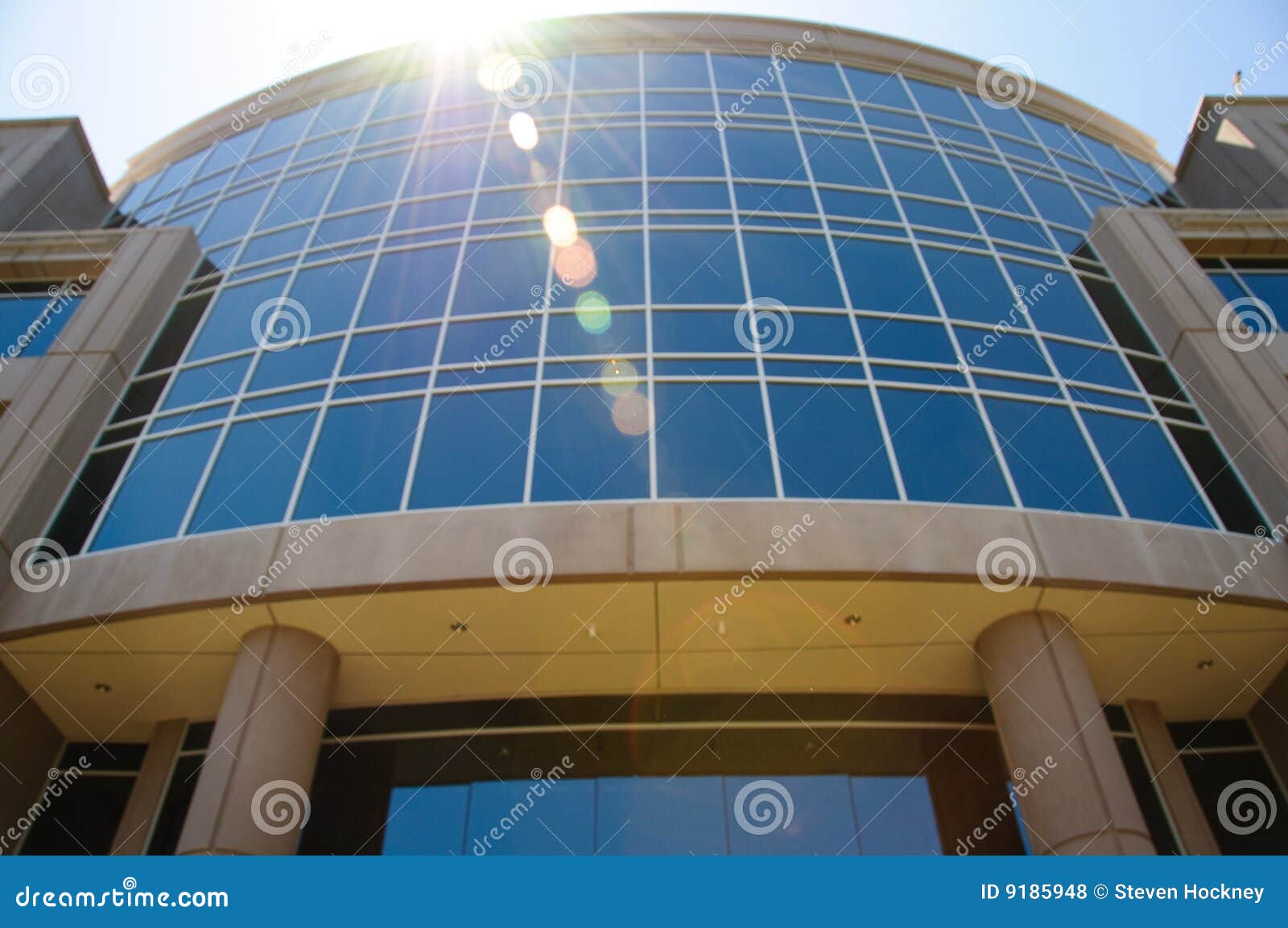 Sun Shining on Office Building Stock Photo - Image of facade, looking ...