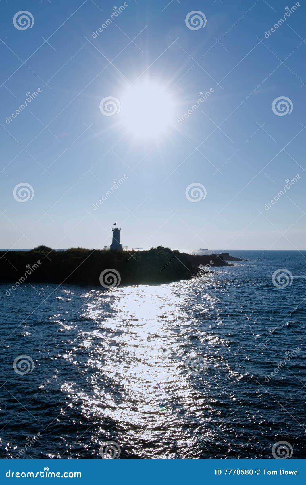 Sun Shining Over Lighthouse Stock Photo - Image of building, shore: 7778580
