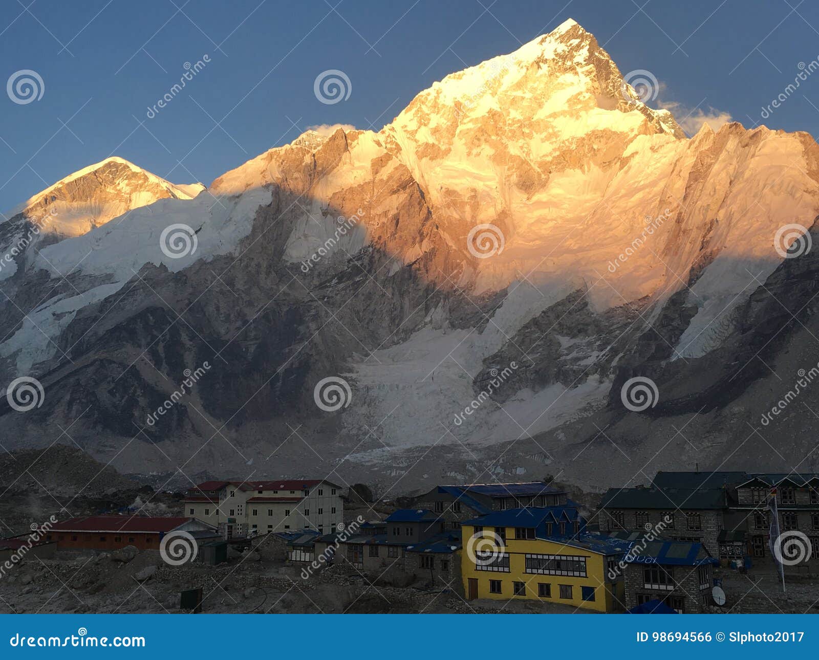 Sun Shining Over Nuptse Mountain, Nepal Stock Photo - Image of everest ...