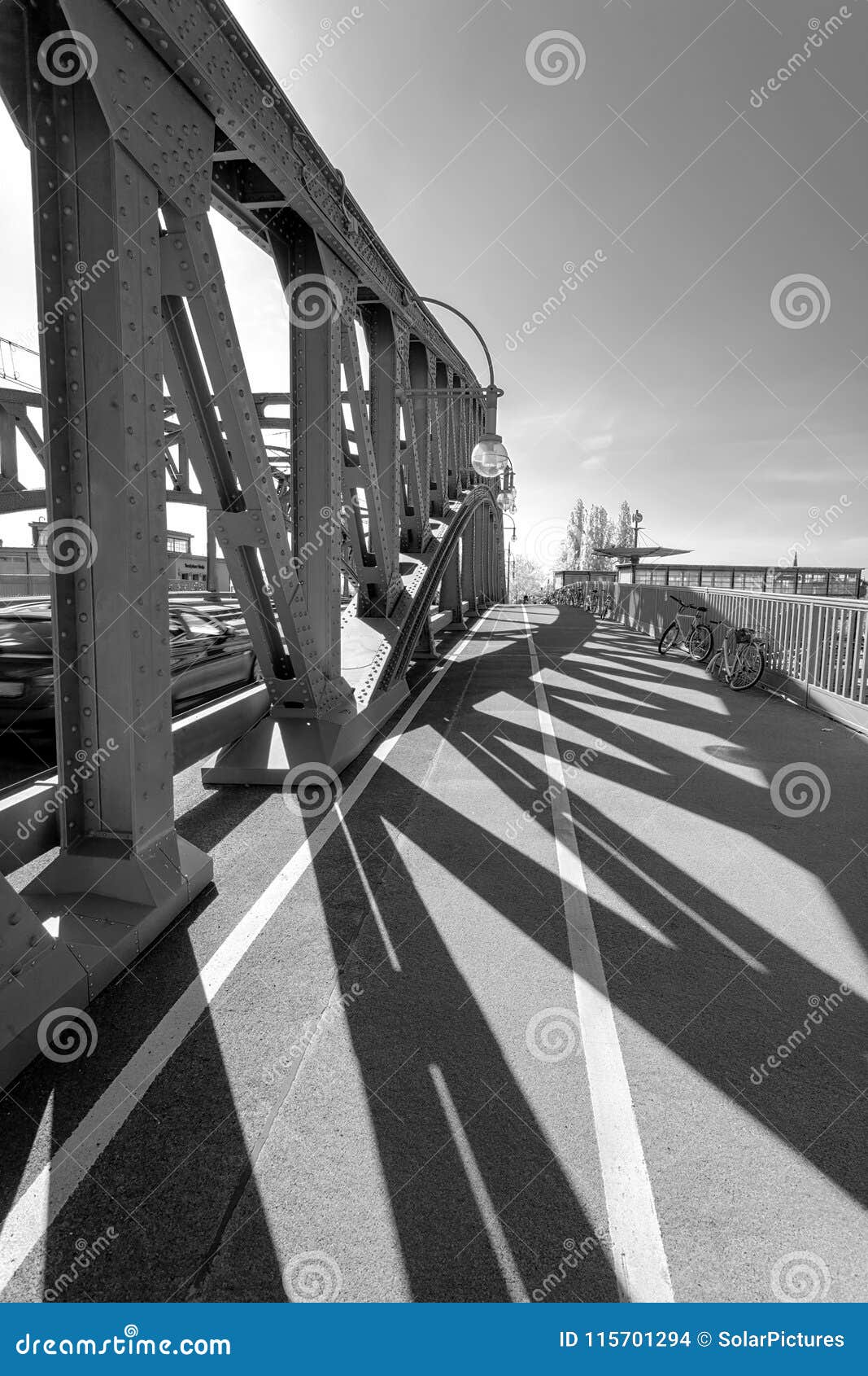 Sun Shining through the Pillars of a Bridge, Casting Long Shadows ...
