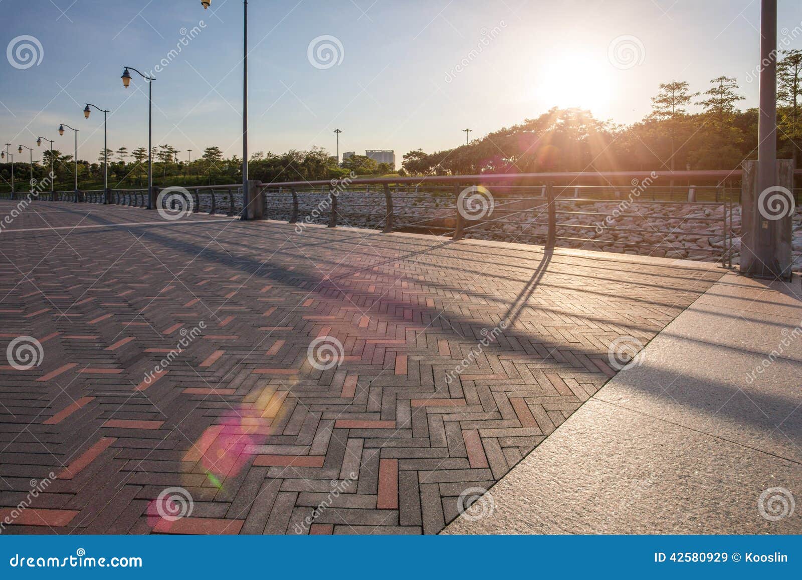 Sun Shining on the Sidewalk Stock Image - Image of outside, sunset ...