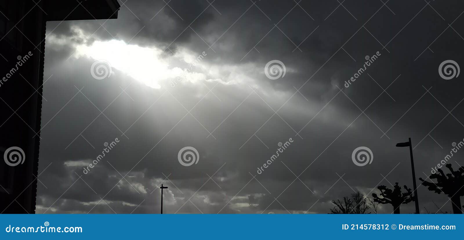 Sun Shining True the Clouds Stock Photo - Image of daytime, darkness ...